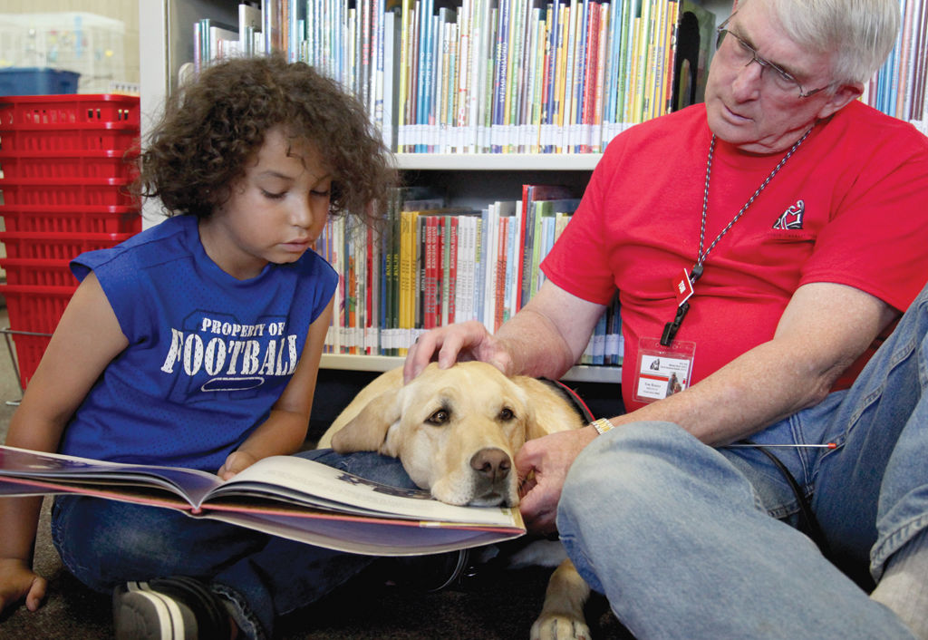 Kids read with canines at Weber library | News, Sports, Jobs - Standard ...